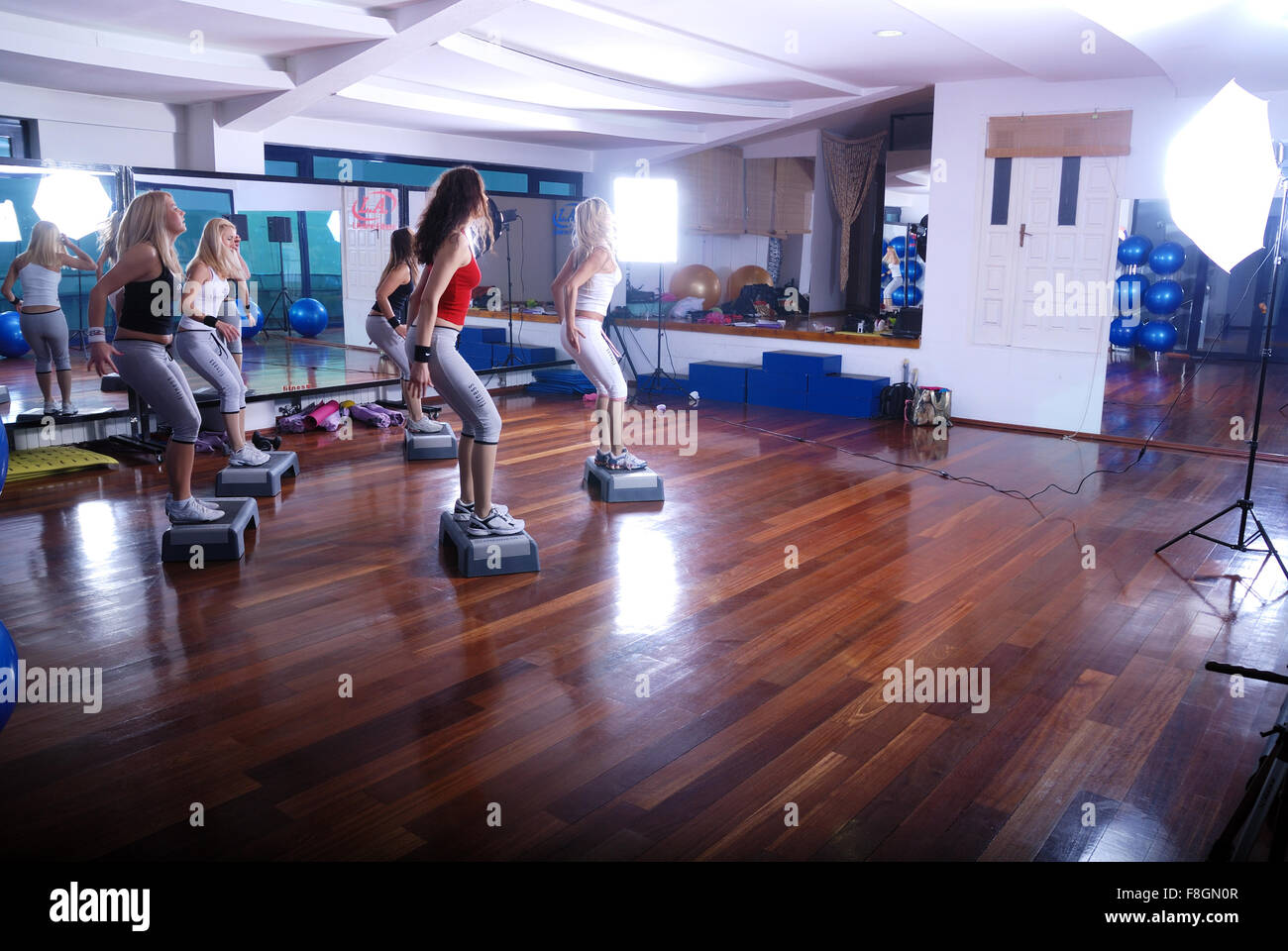 group of young girls stepping in fitness club Stock Photo - Alamy
