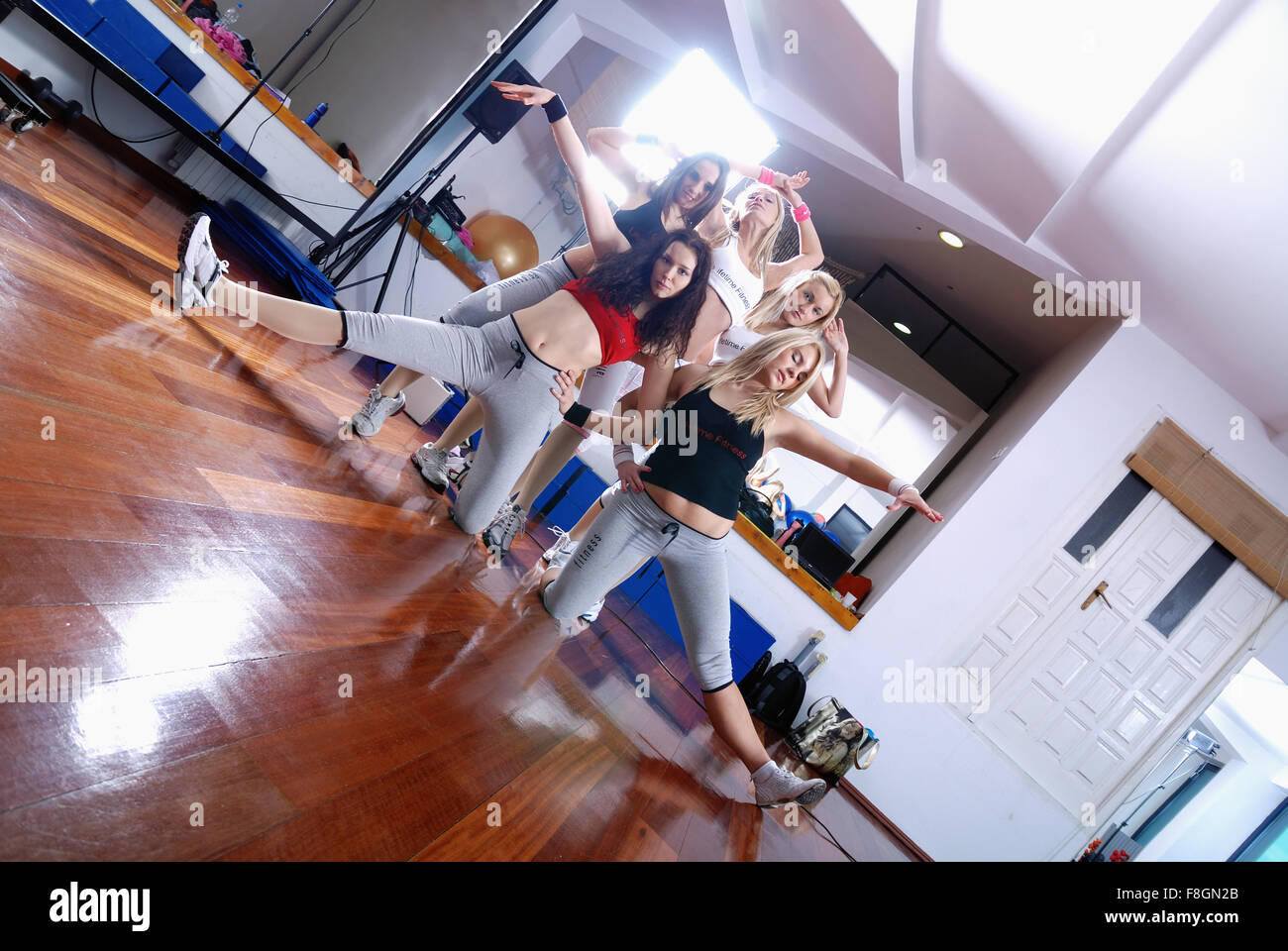 healthy and happy girls group posing in fitness club Stock Photo - Alamy