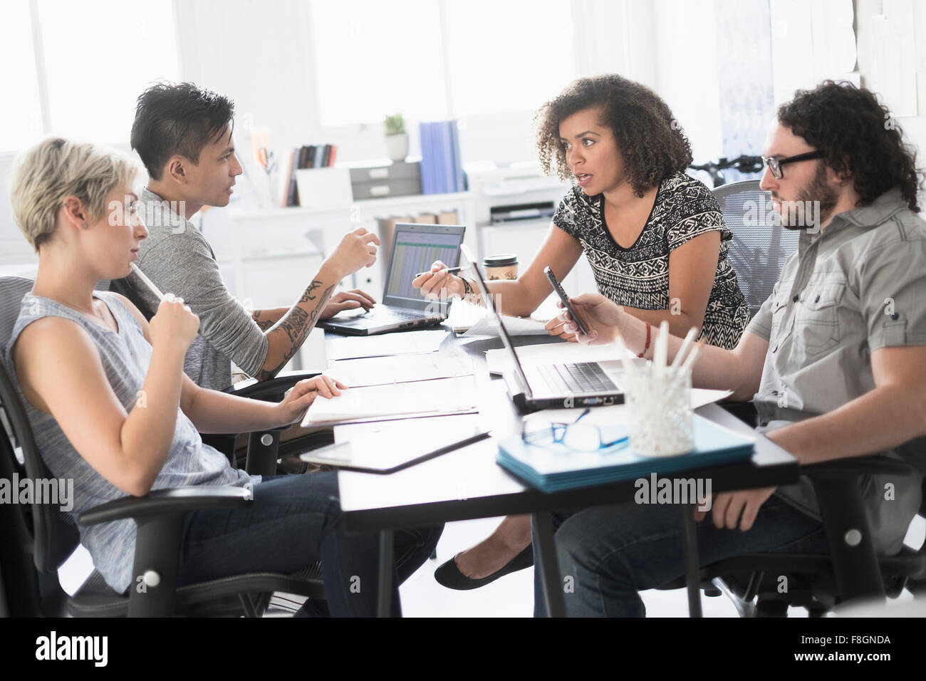 Business people talking in meeting Stock Photo - Alamy