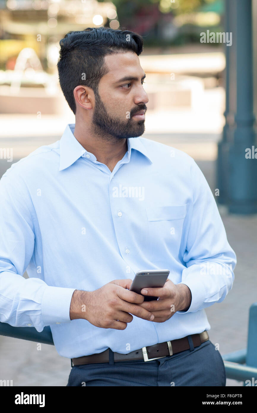 Indian man using phone hi-res stock photography and images - Alamy