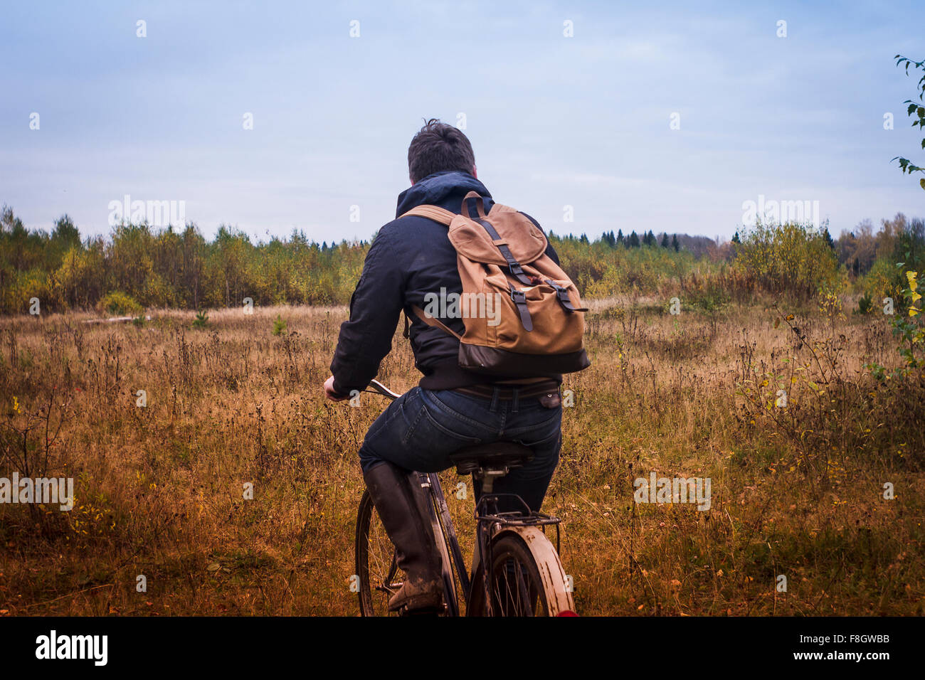 Man riding bike in nature hi-res stock photography and images - Alamy