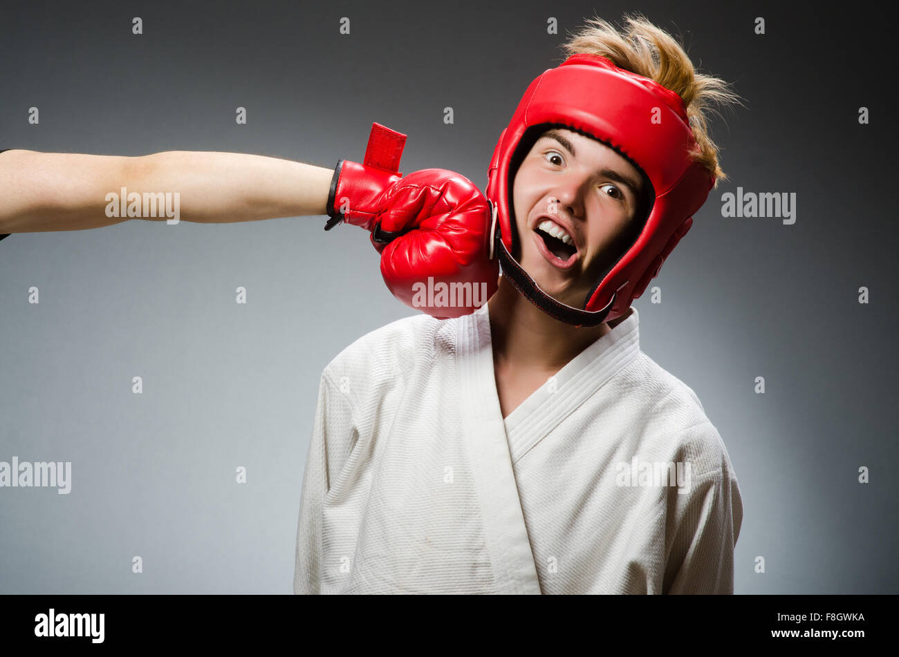 Funny boxer against dark background Stock Photo - Alamy