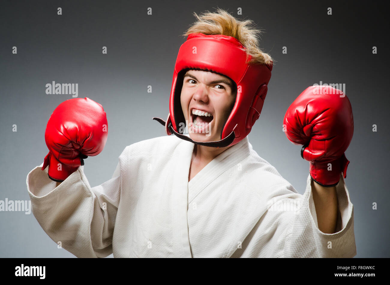 Funny boxer against dark background Stock Photo - Alamy