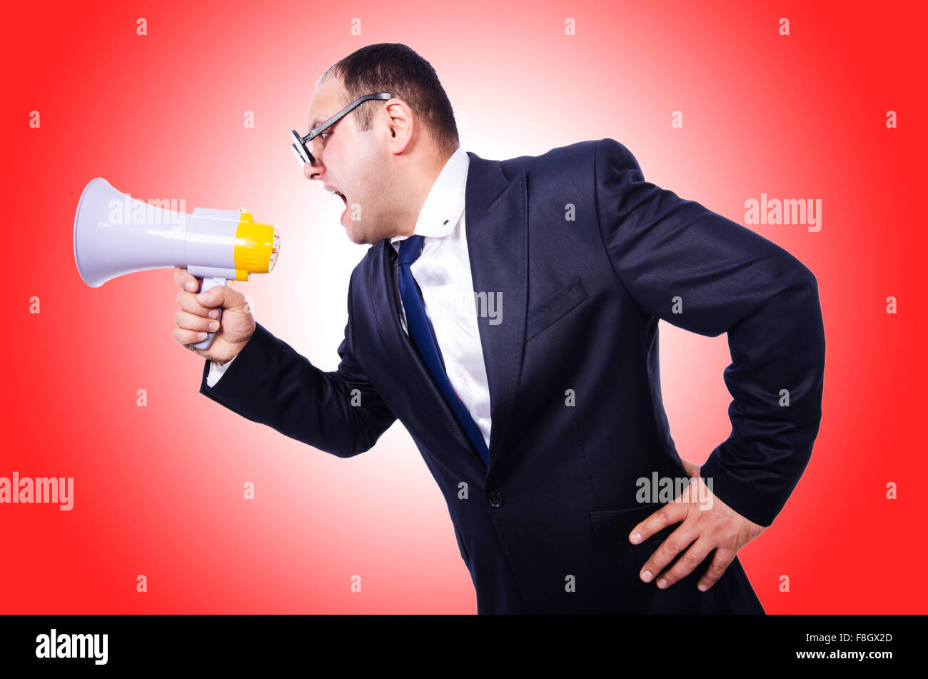 Funny man with loudspeaker on white Stock Photo - Alamy
