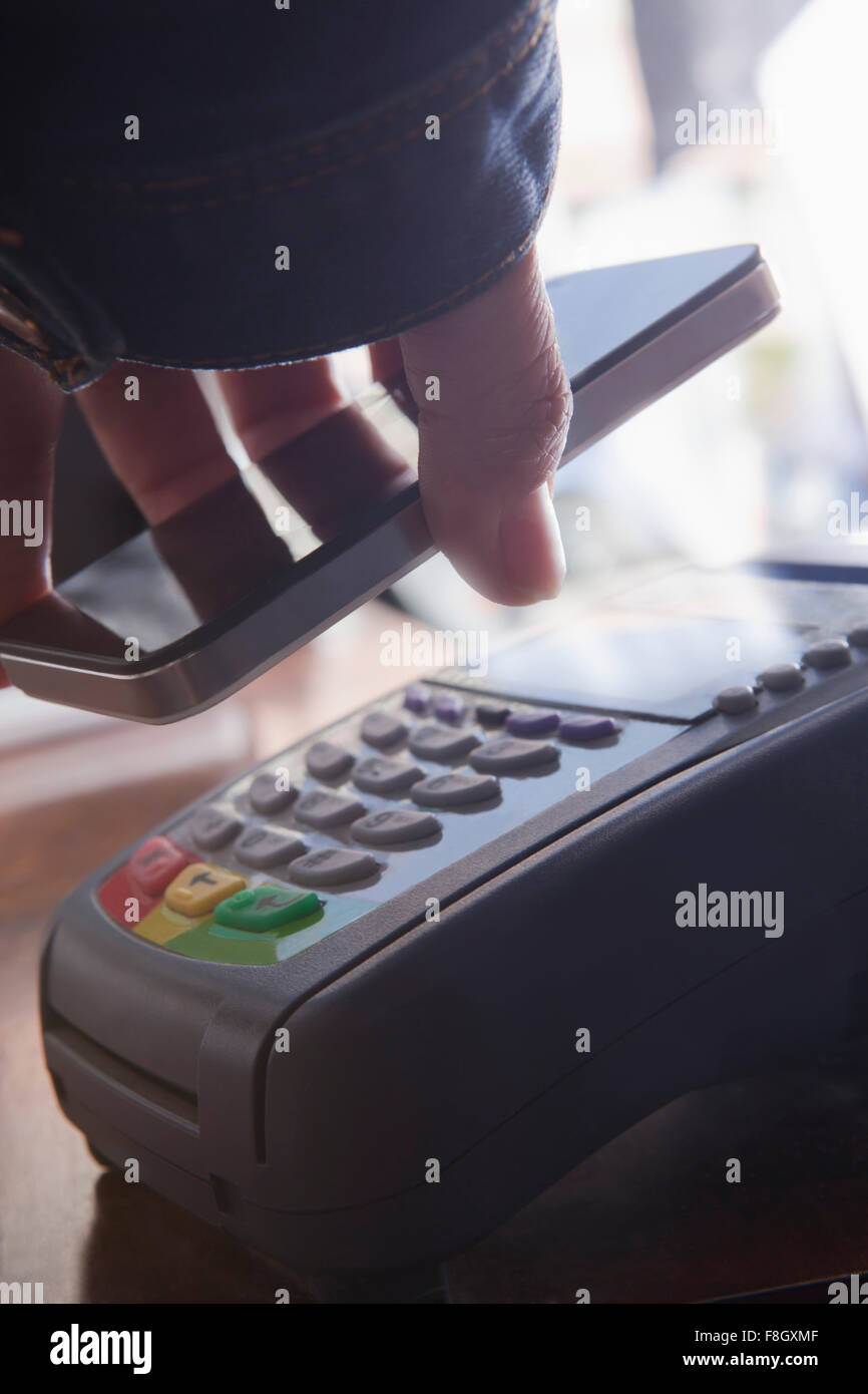 Using holding credit card scanner hi-res stock photography and images ...