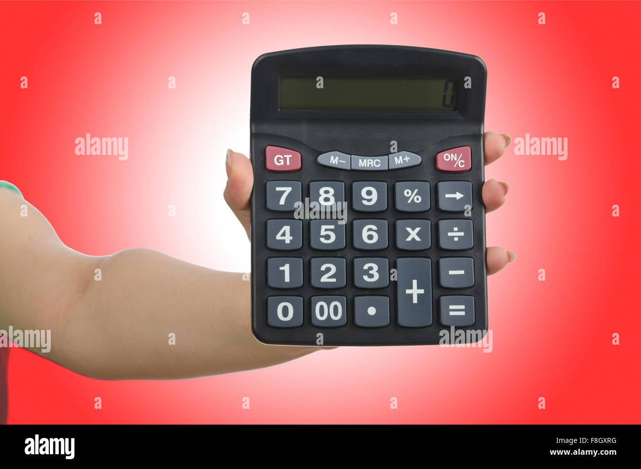 Hand holding calculator on white Stock Photo - Alamy