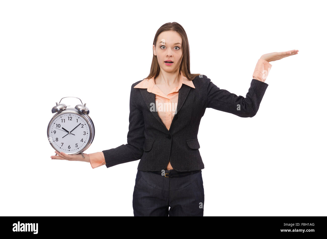Business lady holding alarm clock isolated on white Stock Photo - Alamy