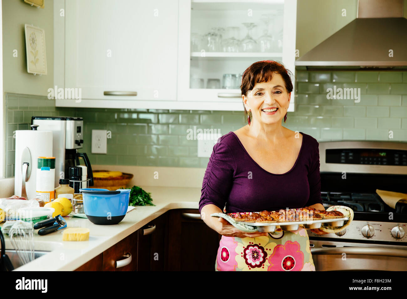 Old lady cooking hi-res stock photography and images - Alamy