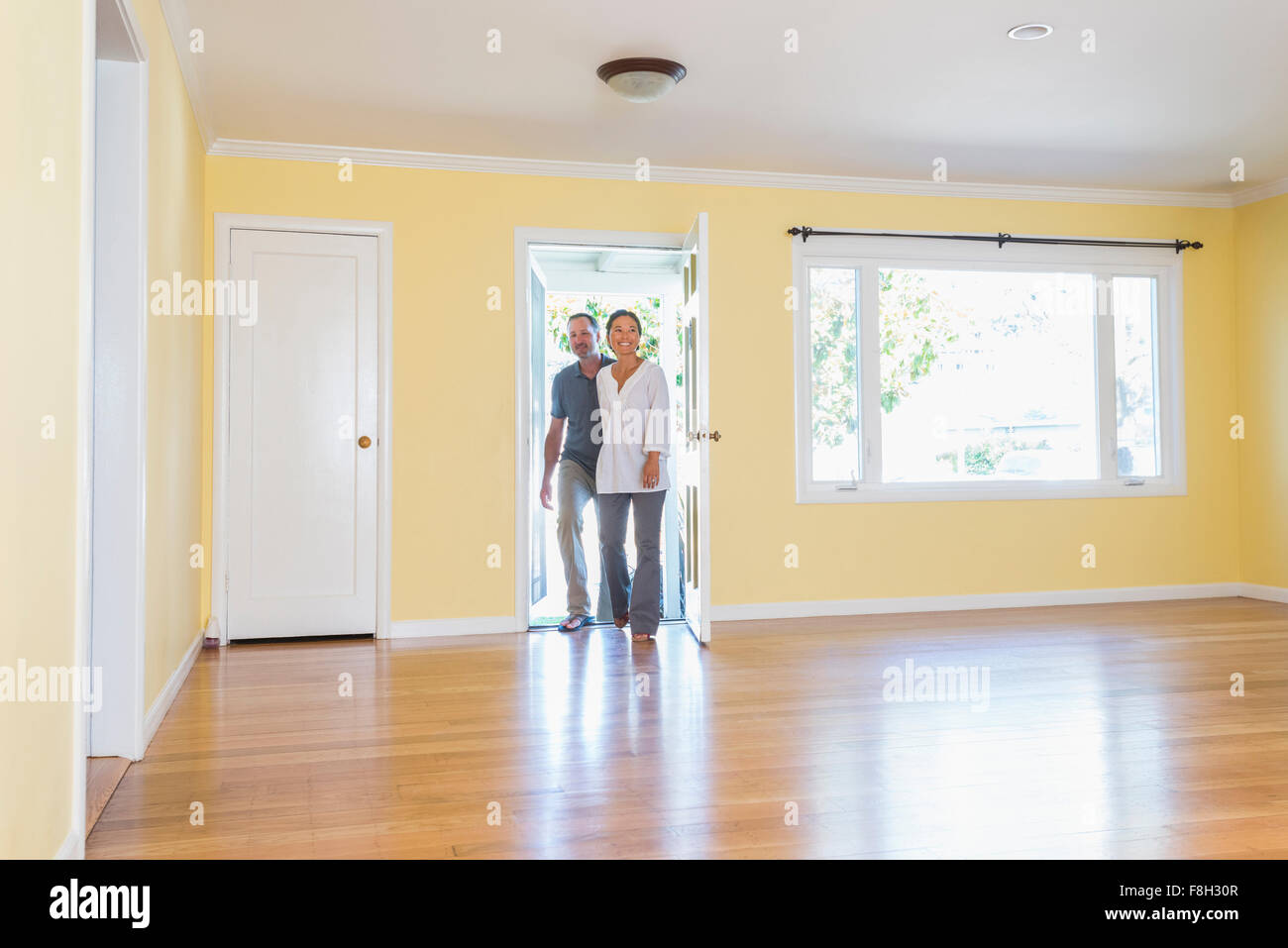 Couple admiring new home Stock Photo - Alamy Couple admiring new home Stock Photo - Alamy