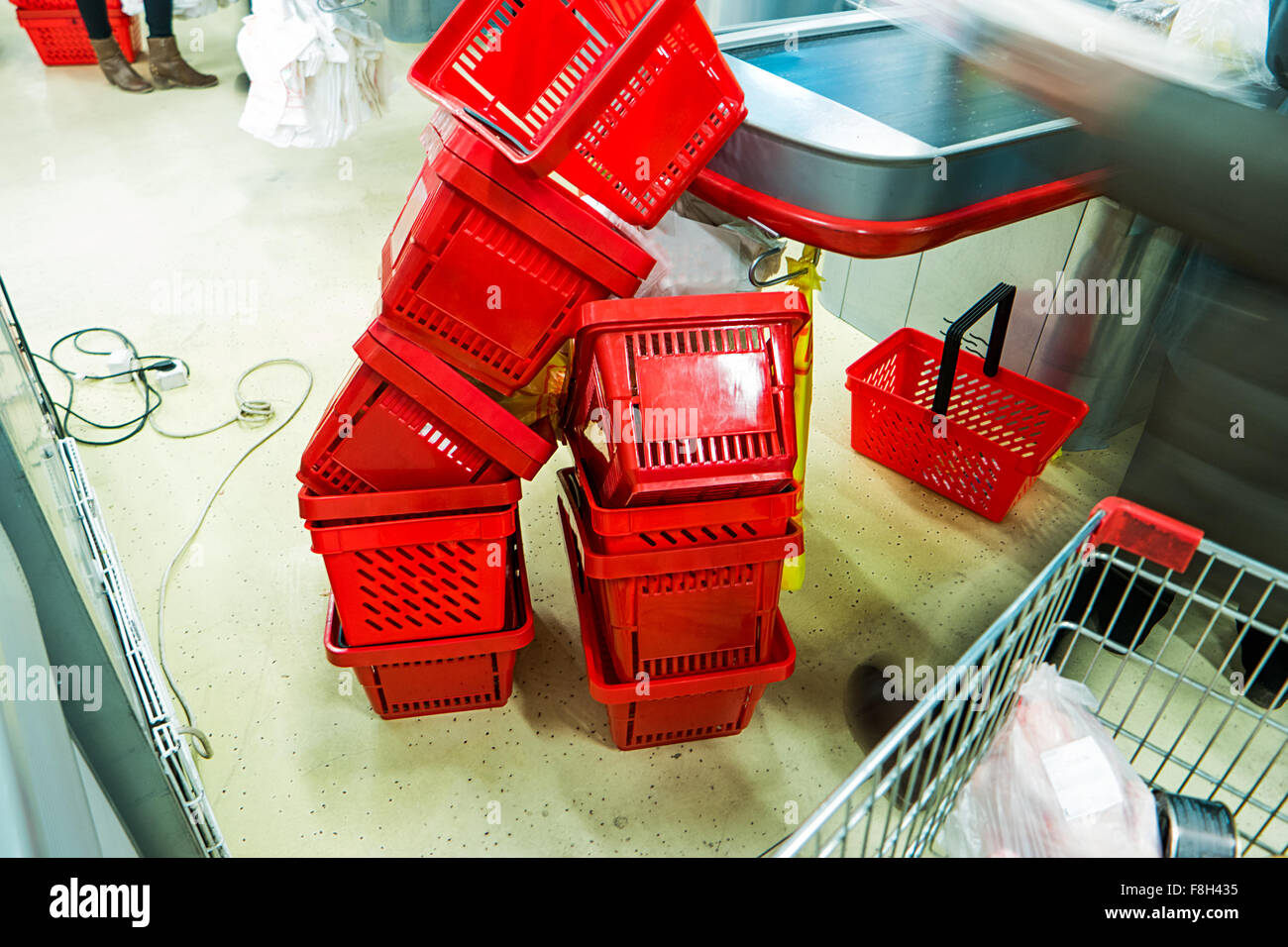 Red plastic shopping baskets hi-res stock photography and images - Alamy