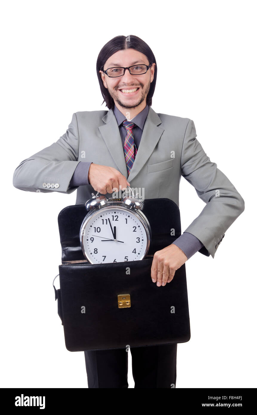 Young businessman holding briefcase and alarm clock isolated on white ...