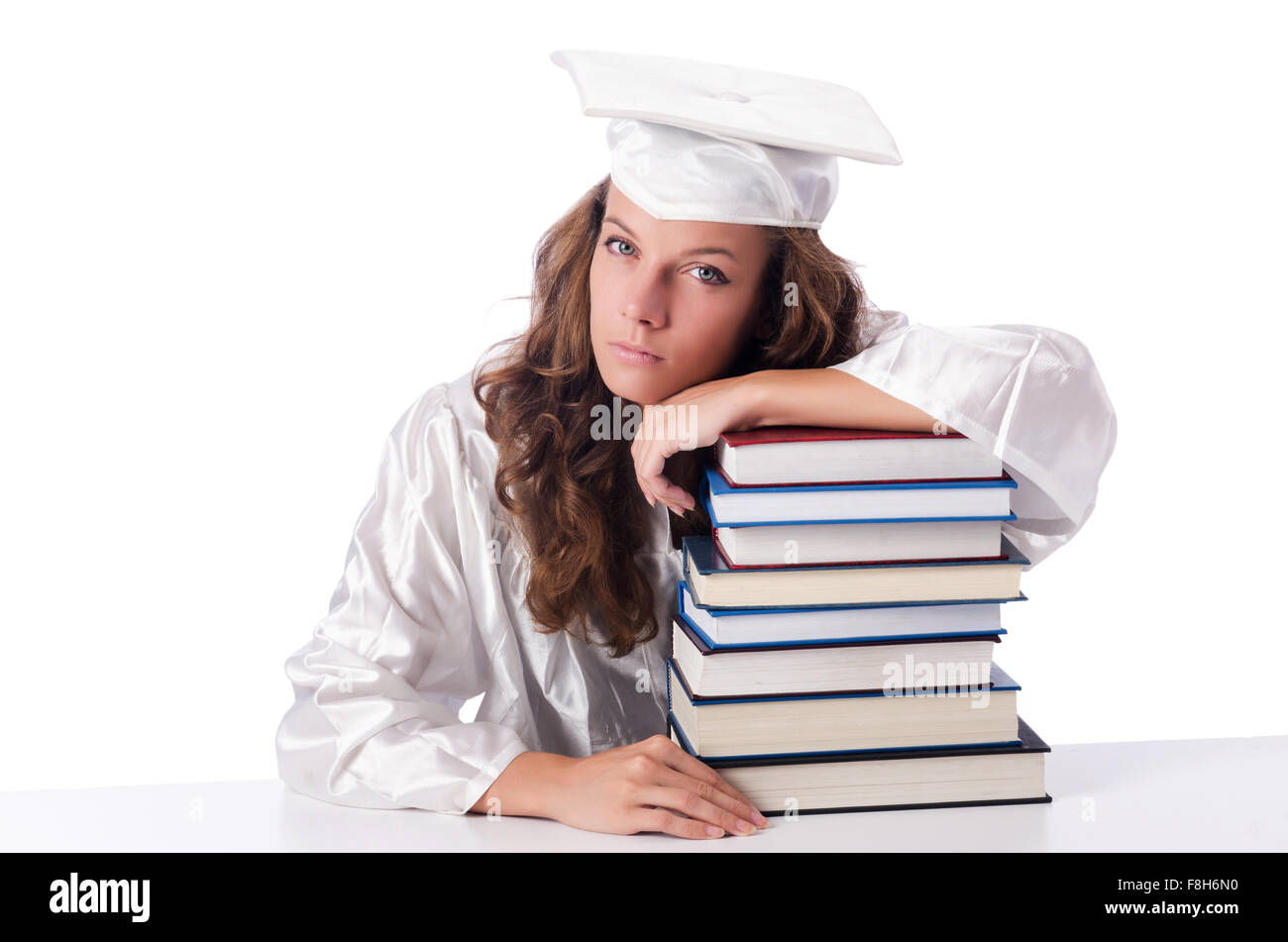 Graduate with book isolated on white Stock Photo - Alamy