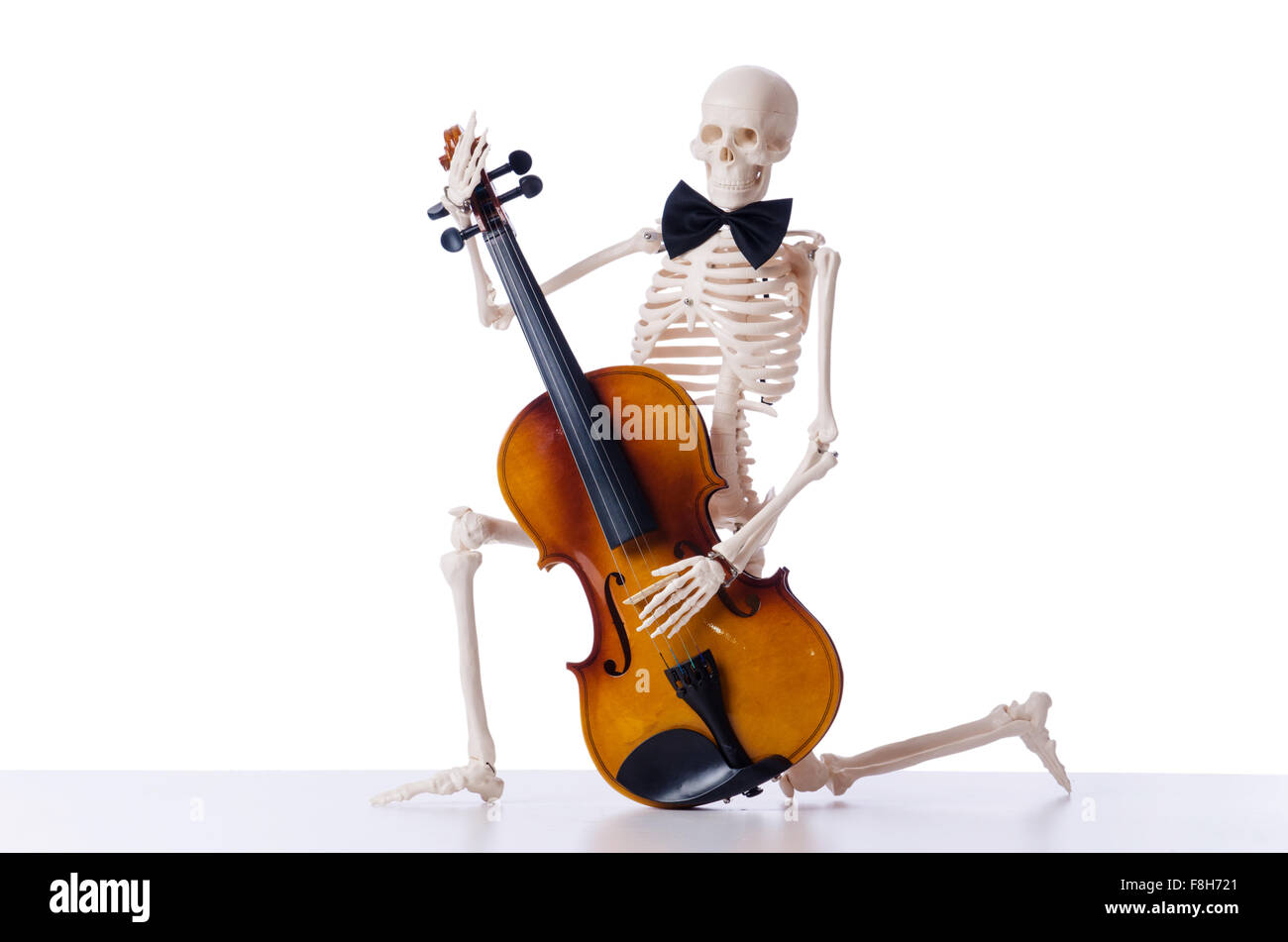 Skeleton playing violin isolated on the white Stock Photo - Alamy