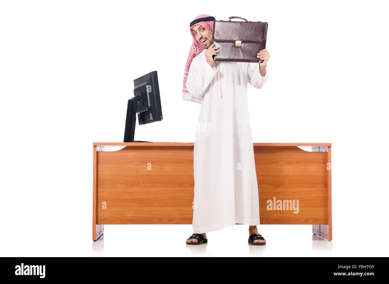 Arab man sitting at his desk Stock Photo - Alamy