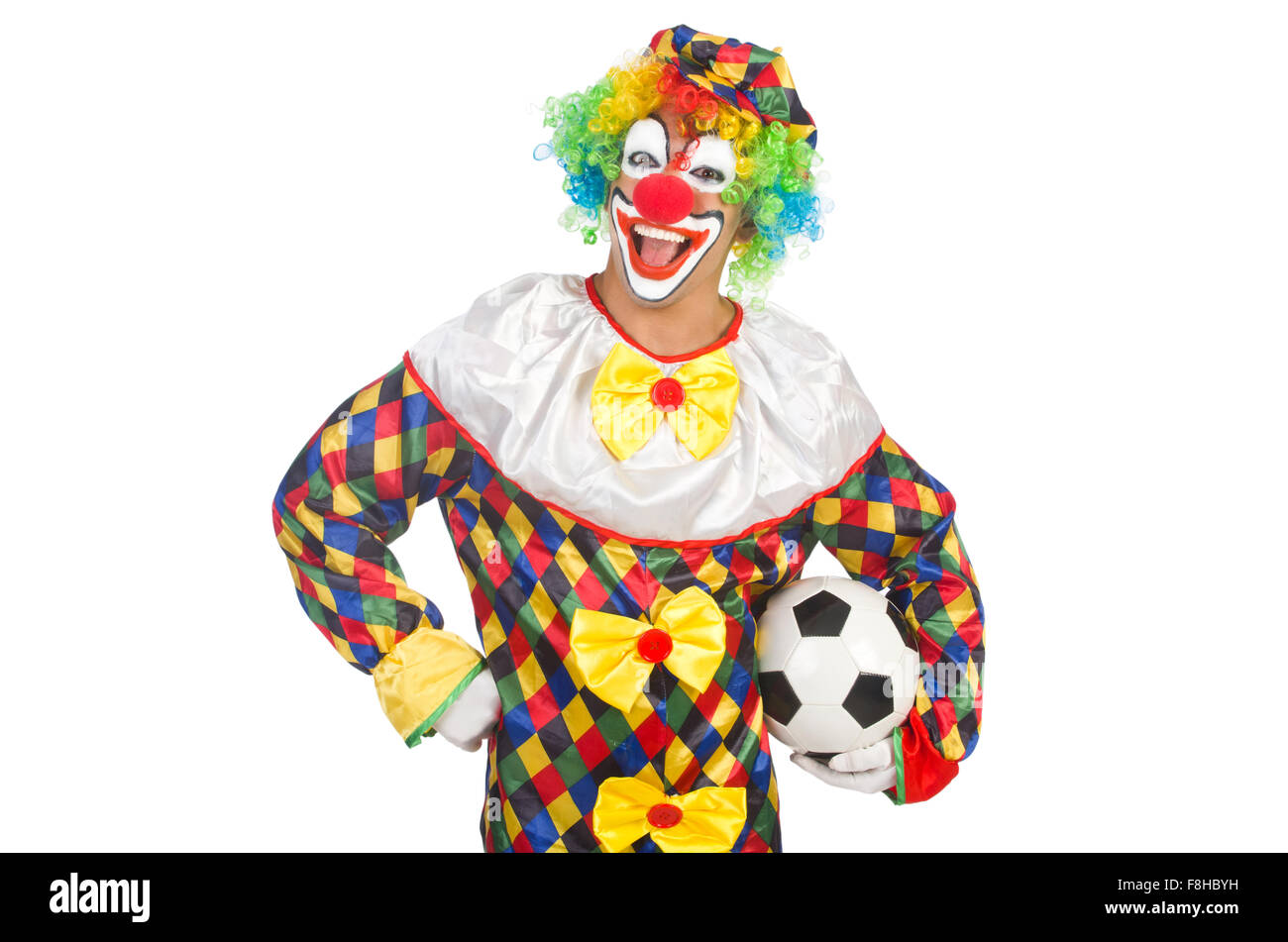 Clown with football ball on white Stock Photo - Alamy