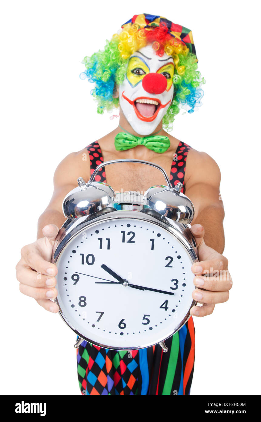 Clown with alarm clock on white Stock Photo - Alamy
