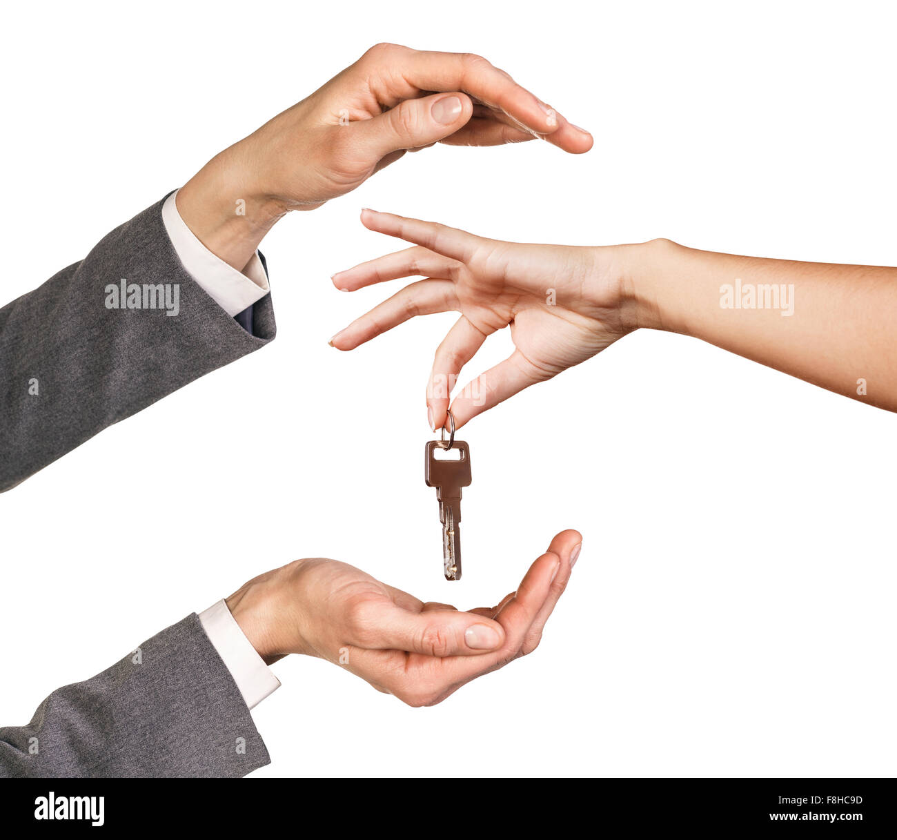 Hand giving a key Stock Photo - Alamy