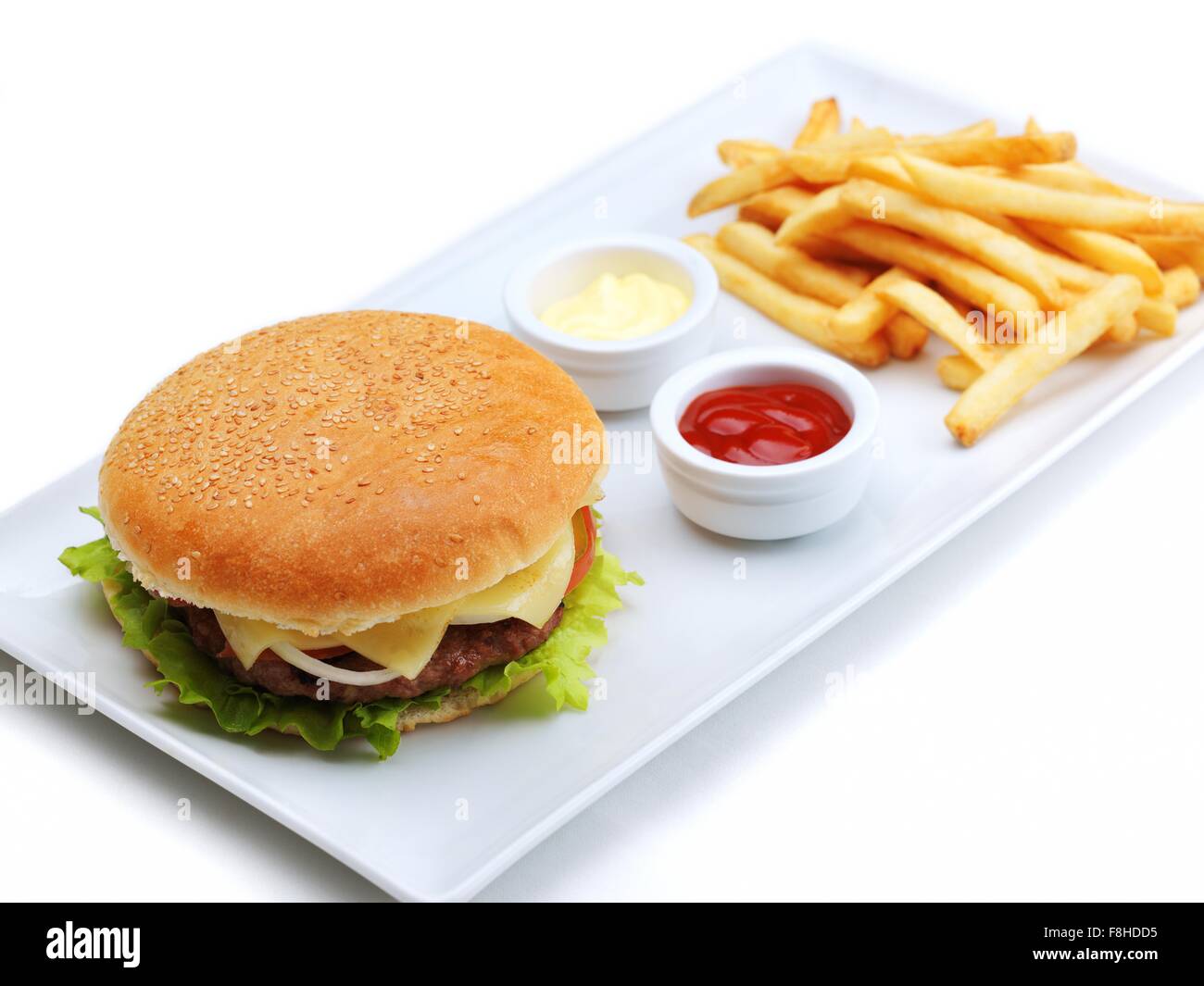 still life with fast food hamburger menu, french fries, soft drink and ...