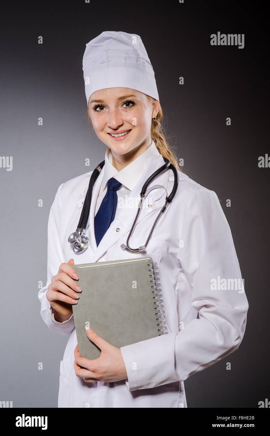 Woman doctor with paper notepad Stock Photo - Alamy