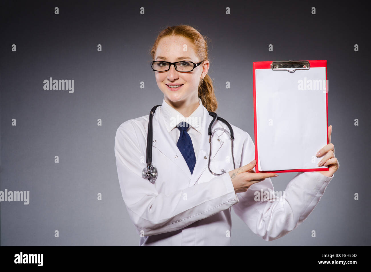 Woman doctor with paper notepad Stock Photo - Alamy