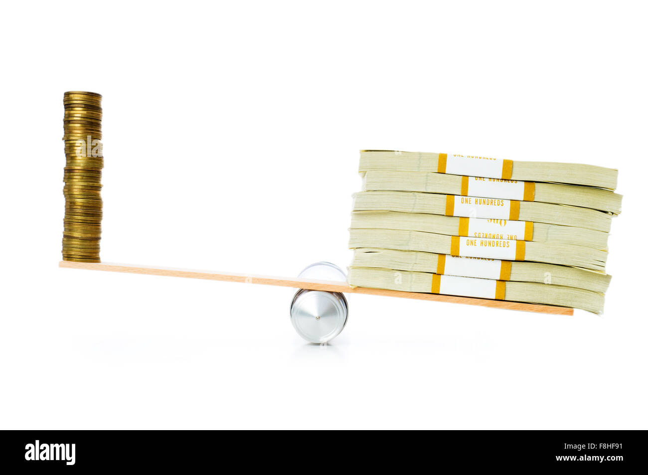 Financial concept - balance between coins and paper money Stock Photo ...