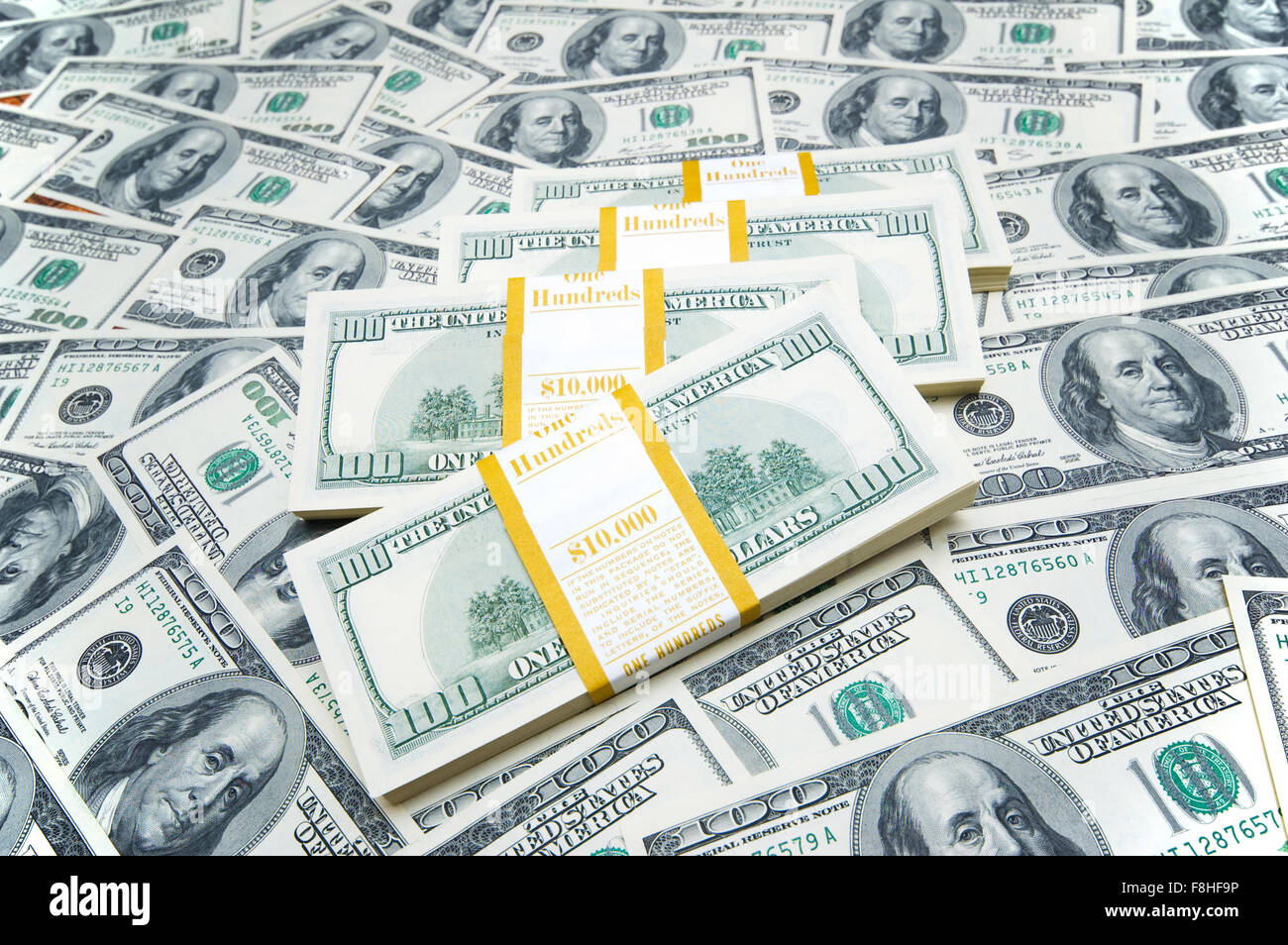 Stack of dollars on money background Stock Photo - Alamy