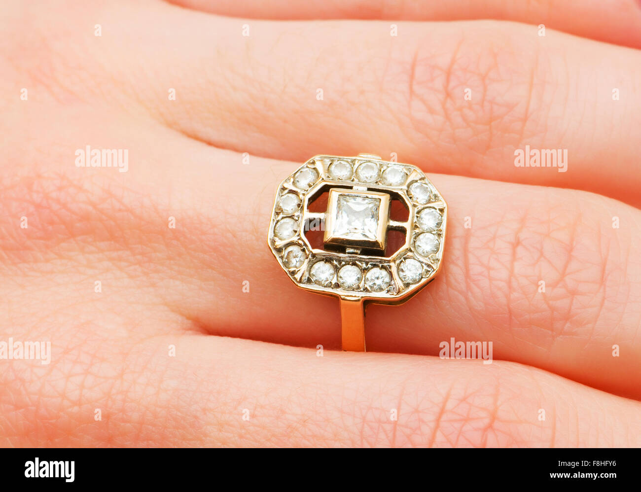 Hand with golden ring Stock Photo - Alamy