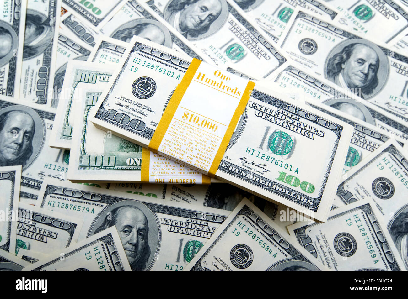 Stack of dollars on money background Stock Photo - Alamy