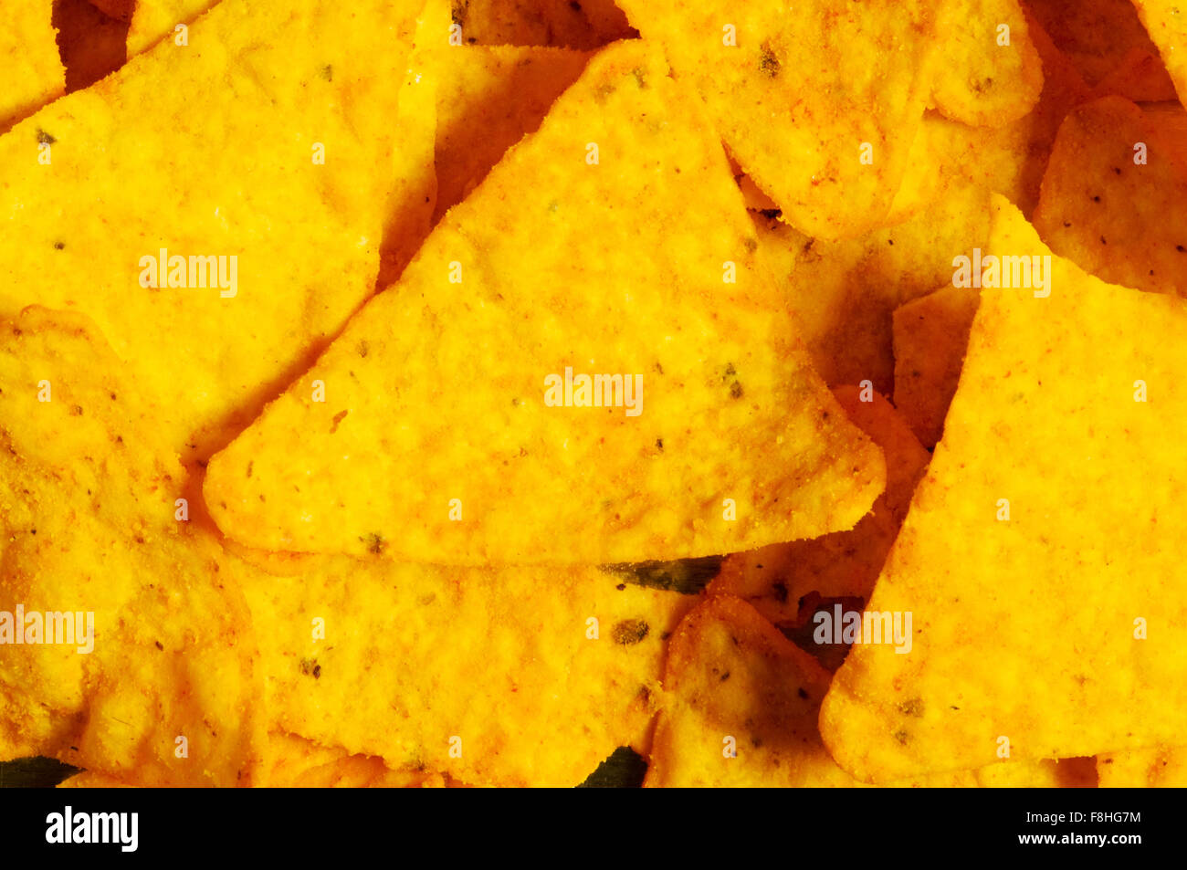 Heap of chips arranged on background Stock Photo - Alamy