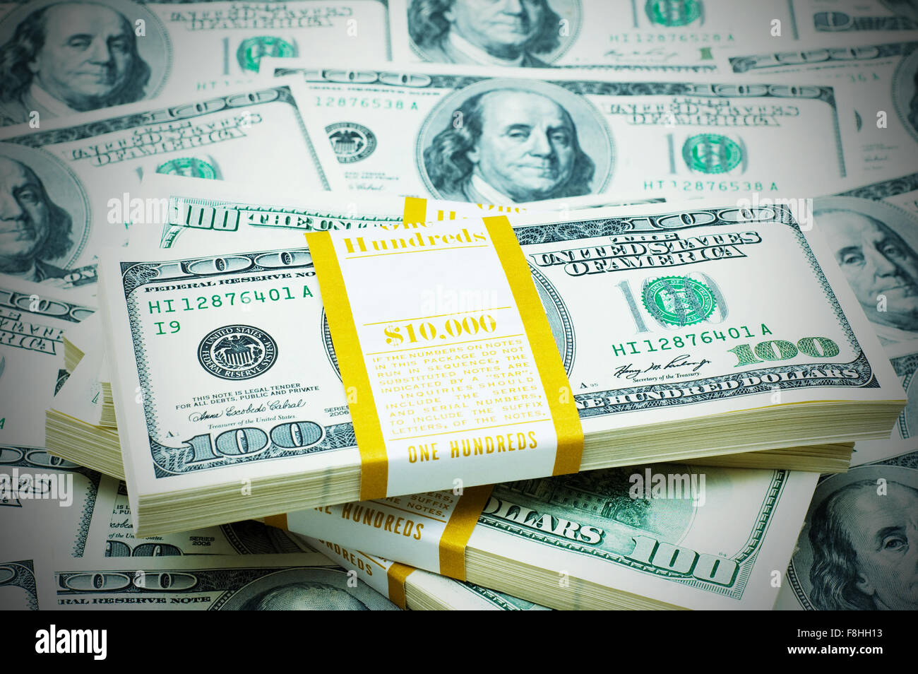 Stack of dollars on money background Stock Photo - Alamy
