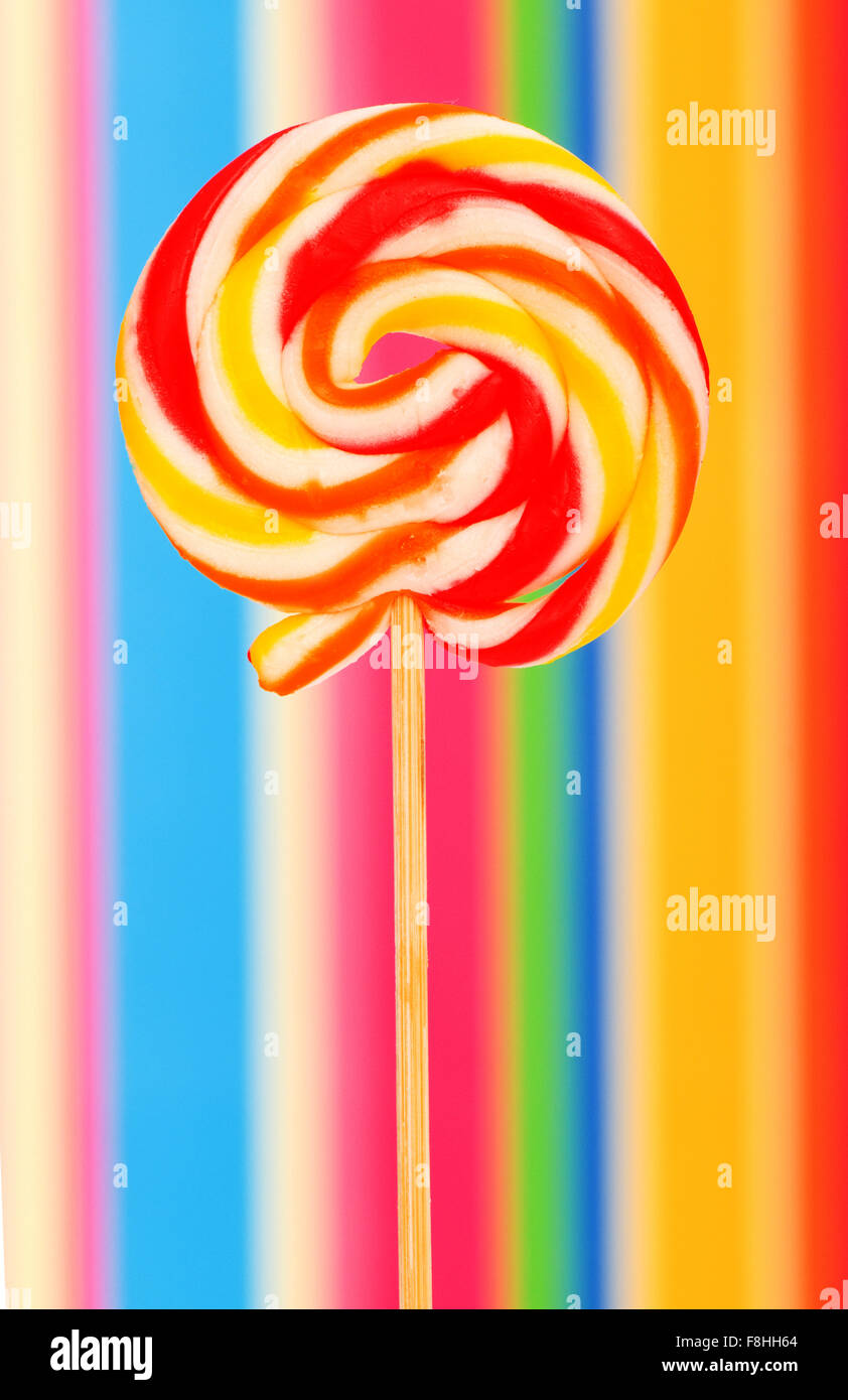 Colourful lollipop against the colourful background Stock Photo - Alamy
