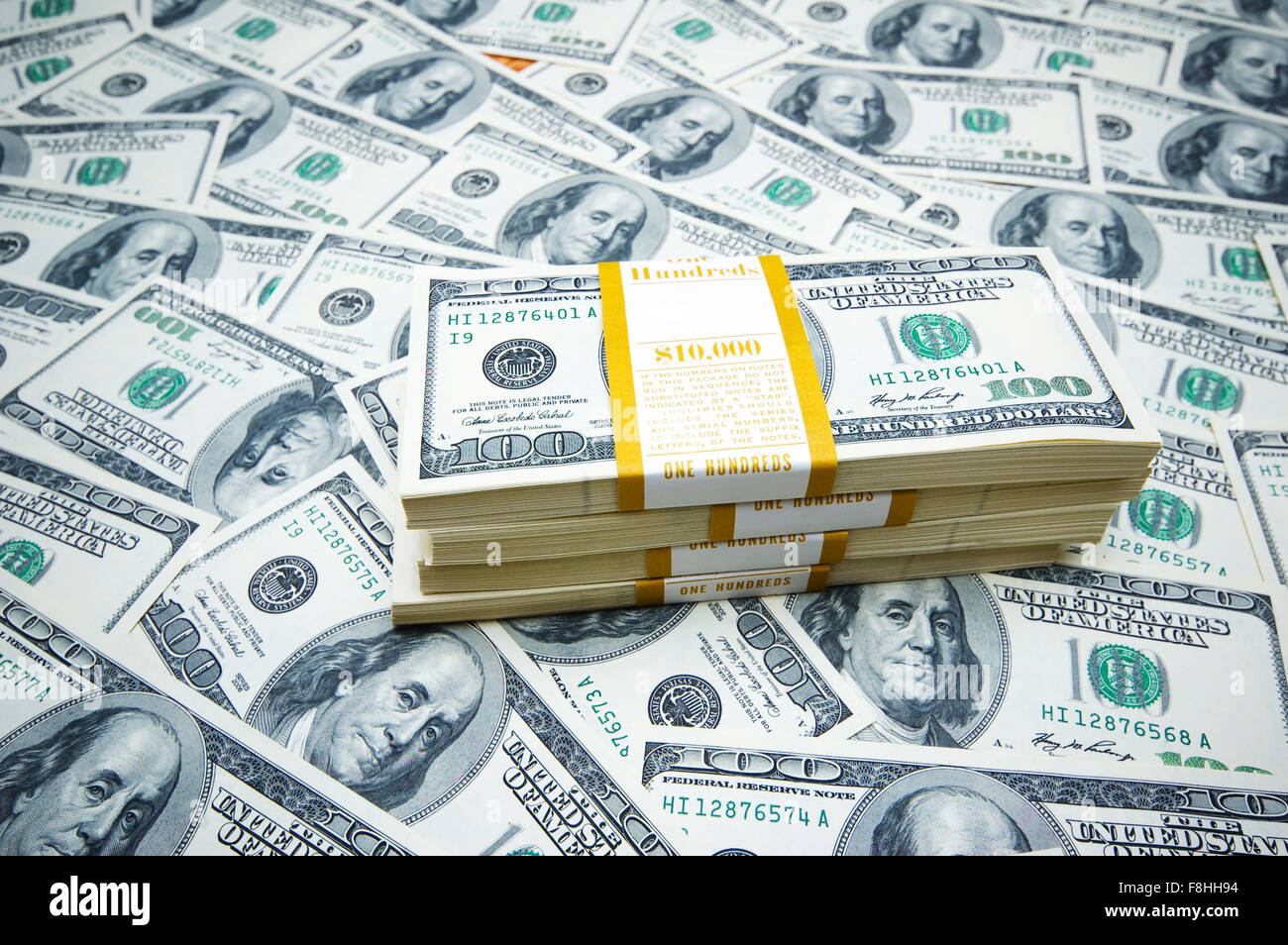 Stack of dollars on money background Stock Photo - Alamy