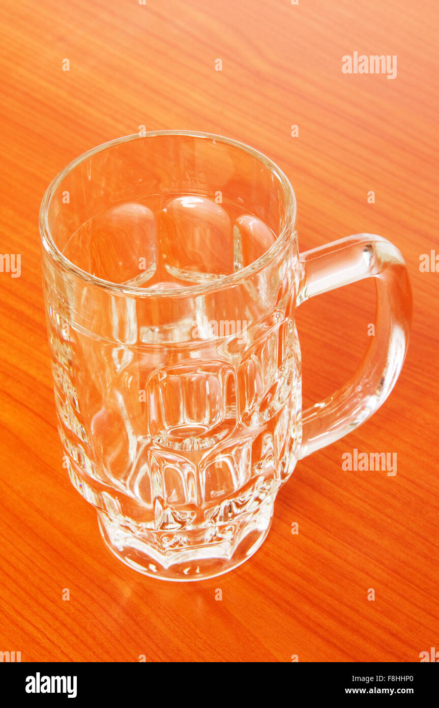 Beer glass on the wooden table Stock Photo - Alamy