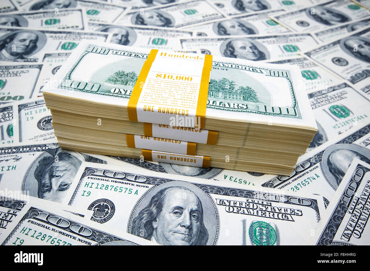 Stack of dollars on money background Stock Photo - Alamy