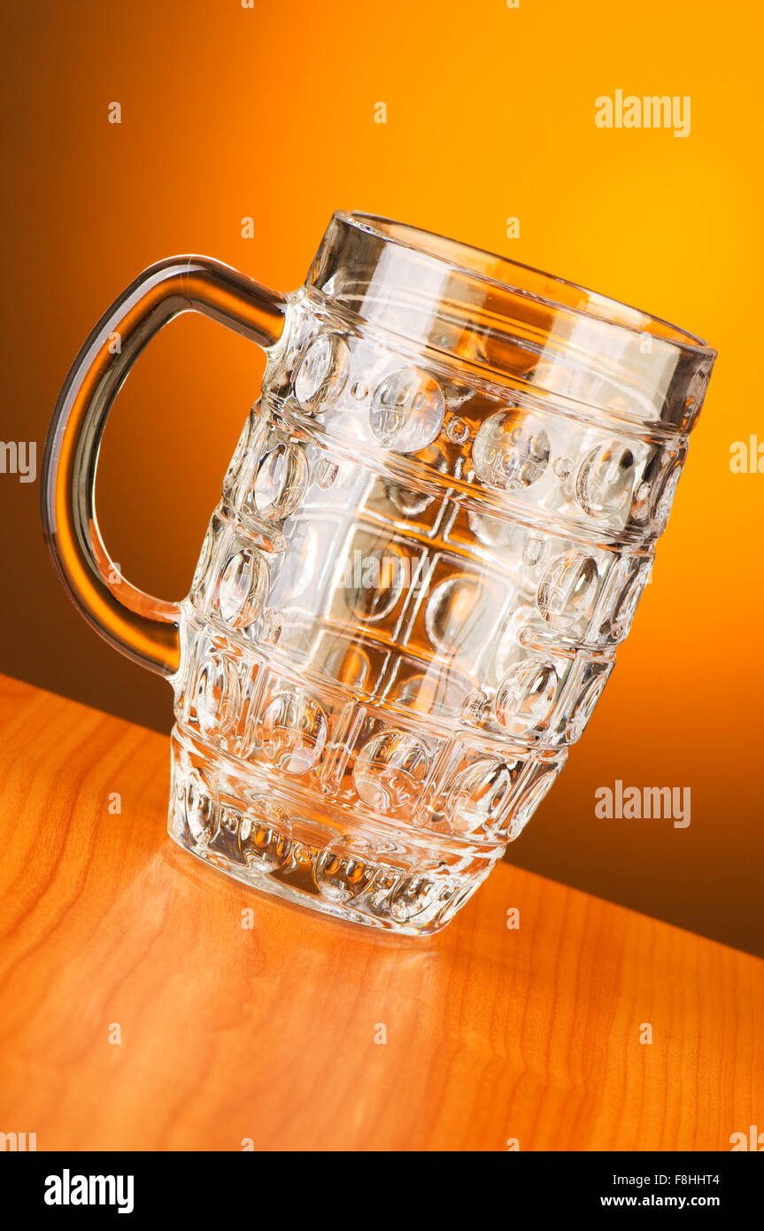 Beer glass against gradient background Stock Photo - Alamy