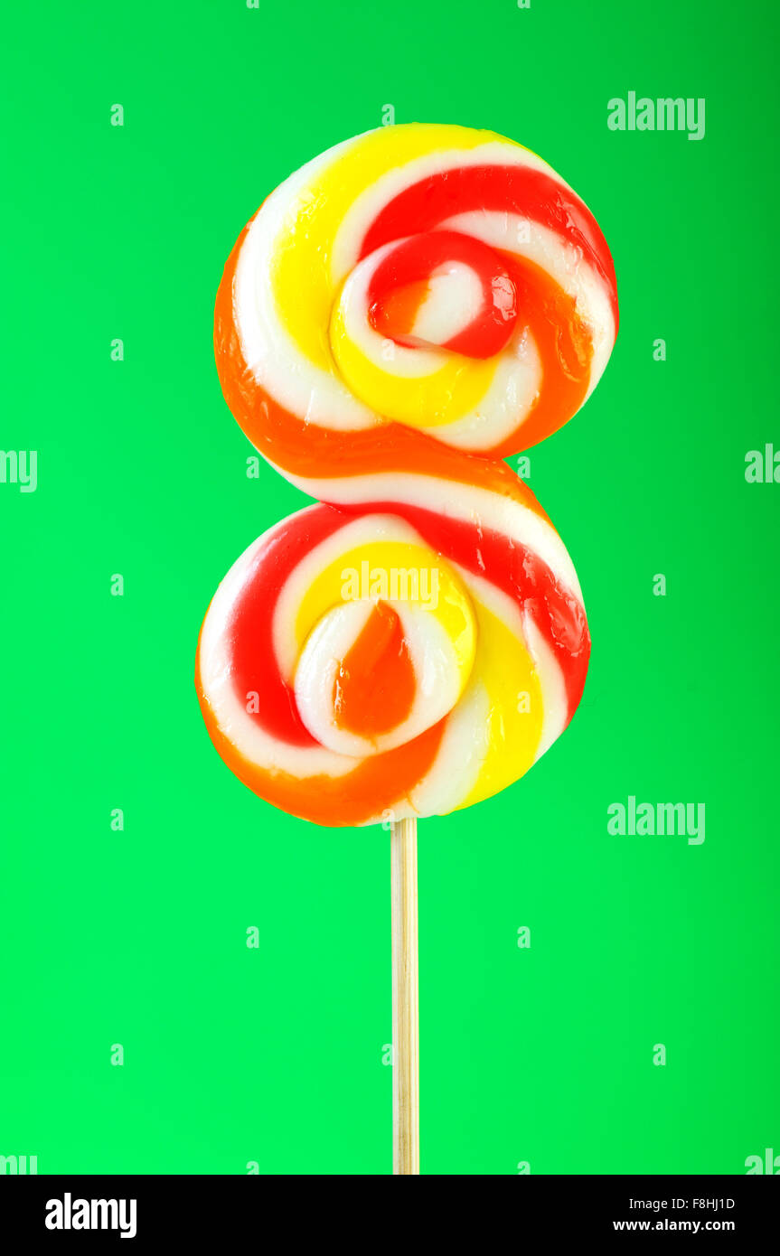 Colourful lollipop against the colourful background Stock Photo - Alamy
