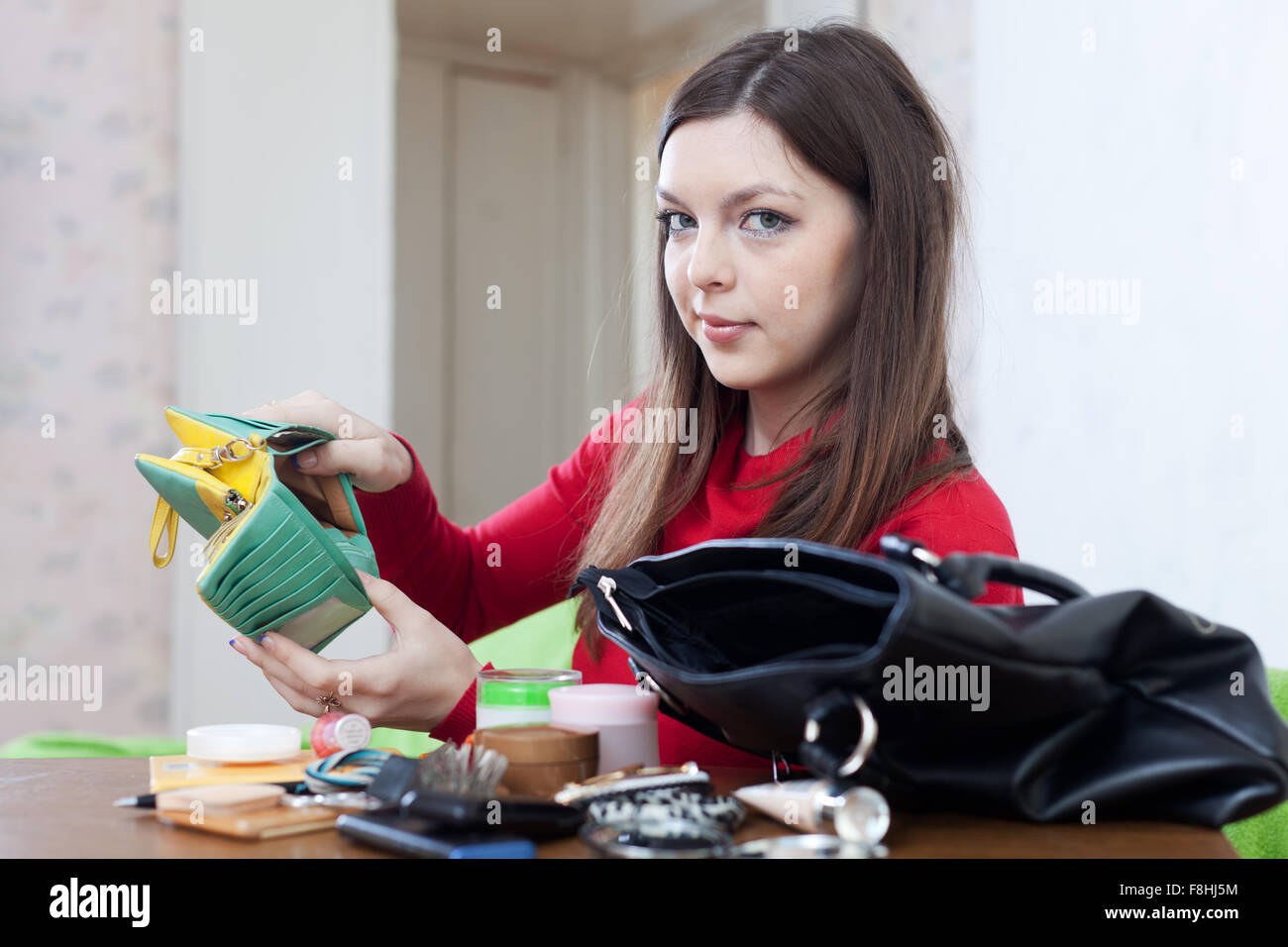Find finding in purse hi-res stock photography and images - Alamy