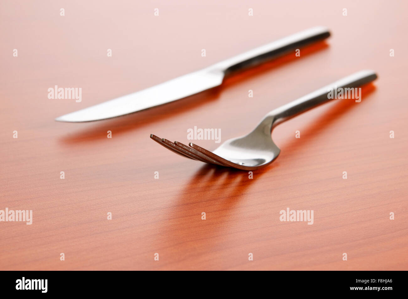 Set of utensils arranged on the table Stock Photo - Alamy