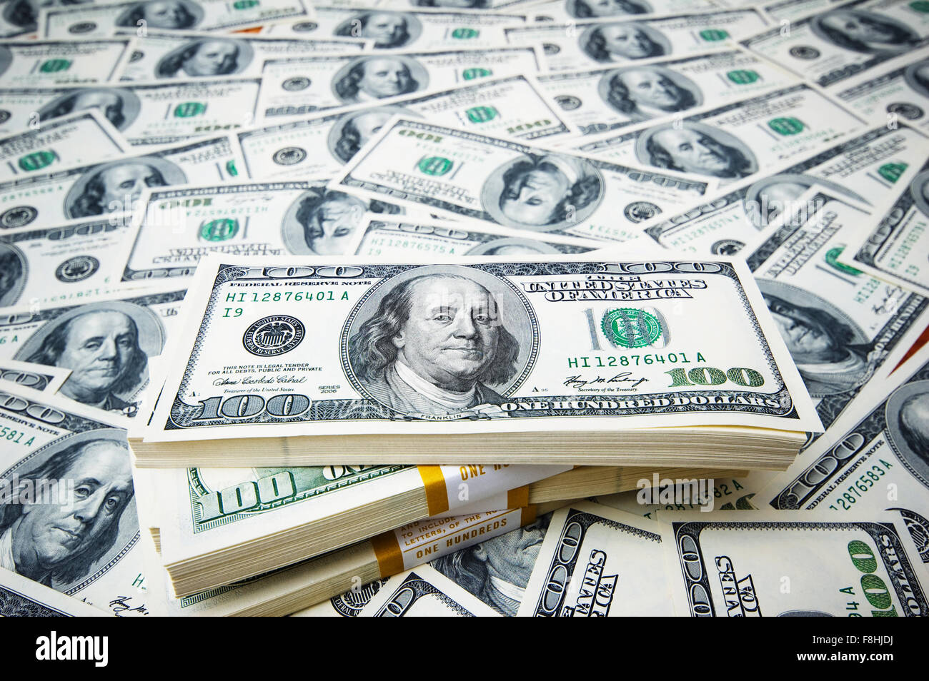 Stack of dollars on money background Stock Photo - Alamy