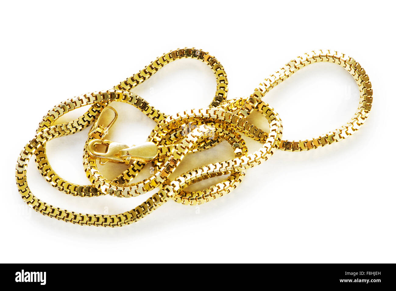 Golden chain isolated on the white background Stock Photo - Alamy