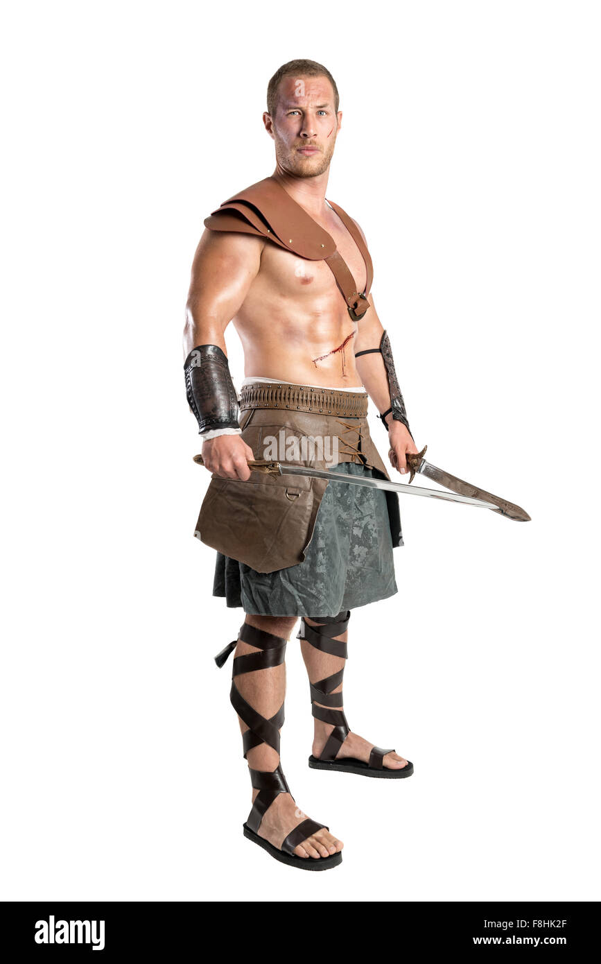 Gladiator posing isolated in a white background Stock Photo - Alamy