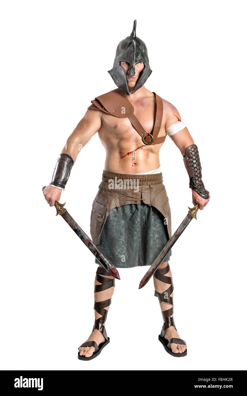 Gladiator posing isolated in a white background Stock Photo - Alamy