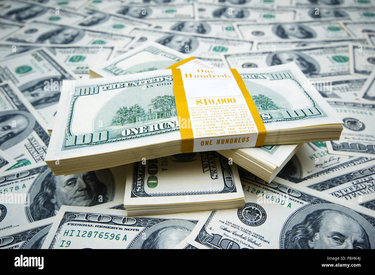 Stack of dollars on money background Stock Photo - Alamy
