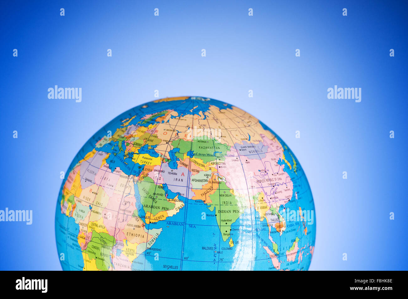 Globalisation concept - globe against gradient colorful background ...