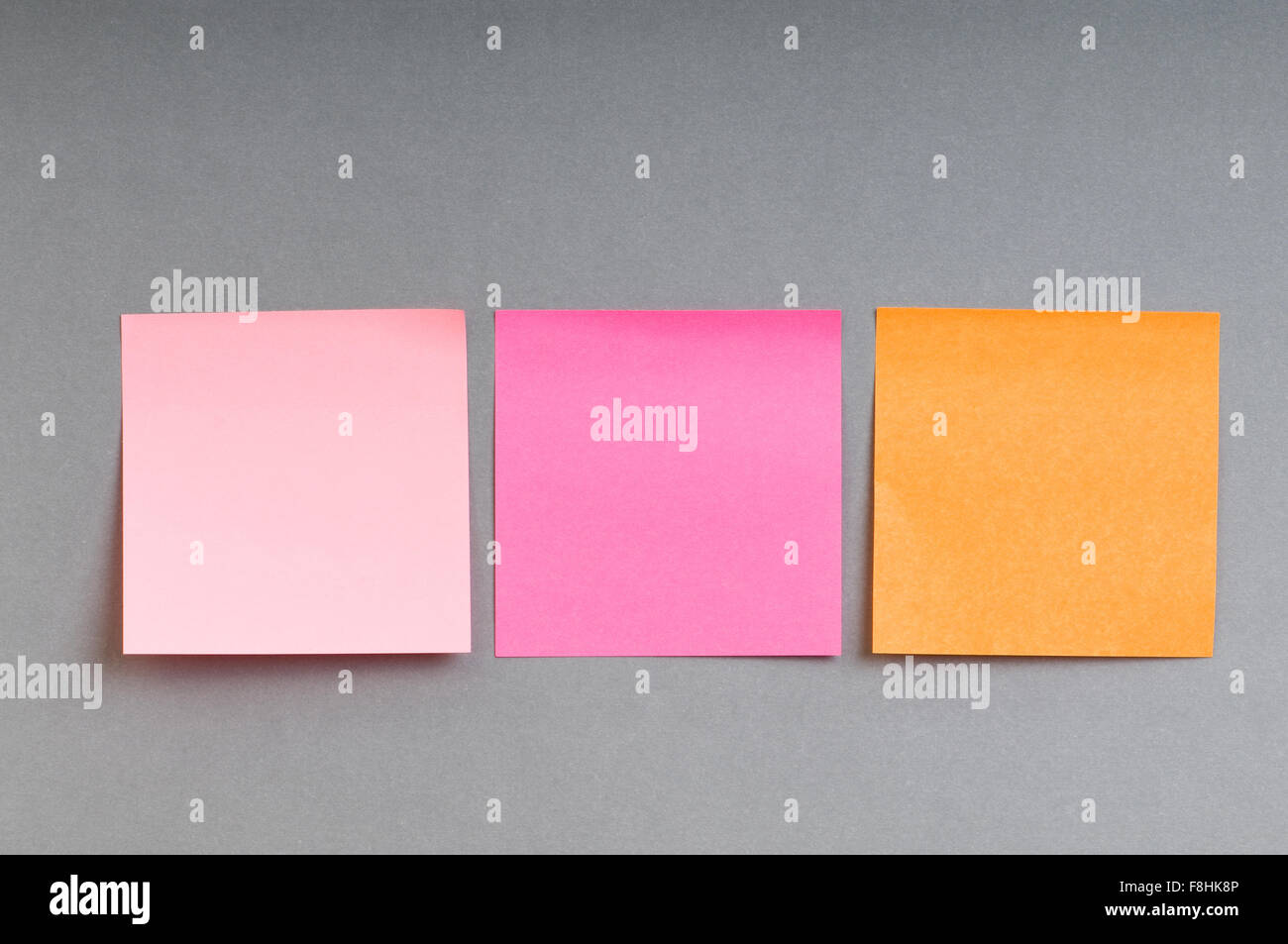 Reminder notes on the bright colorful paper Stock Photo - Alamy