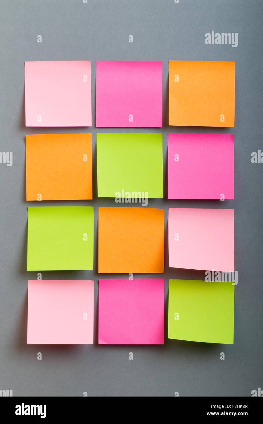 Reminder notes on the bright colorful paper Stock Photo - Alamy