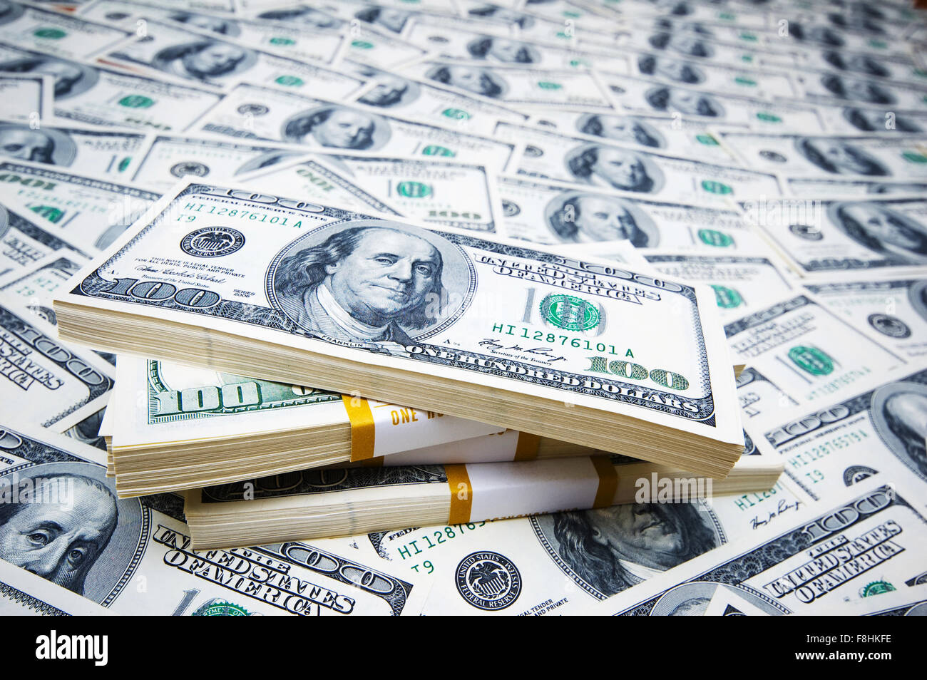 Stack of dollars on money background Stock Photo - Alamy