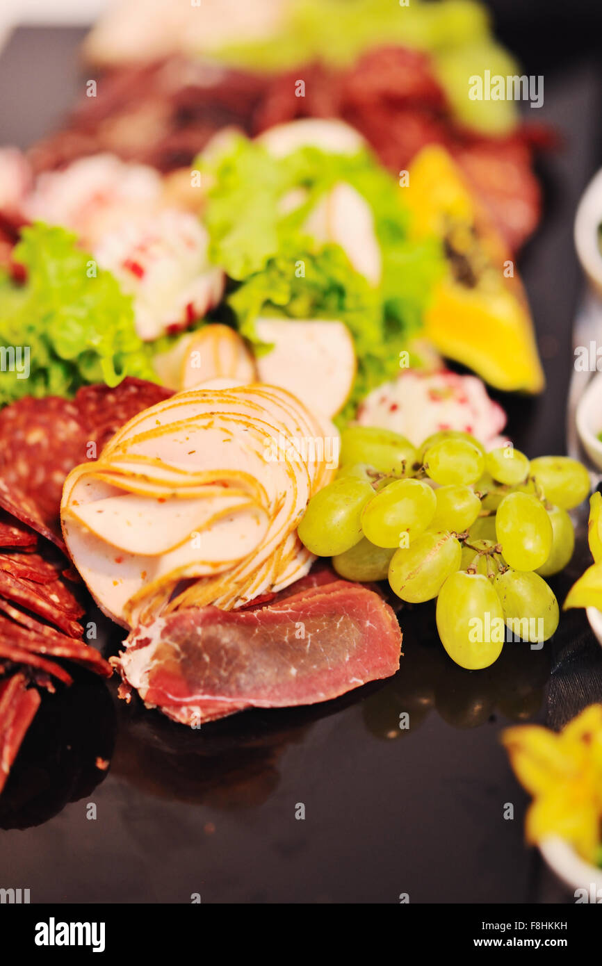 buffed food closeup of fruits, vegetables, meat and fish arranged on ...