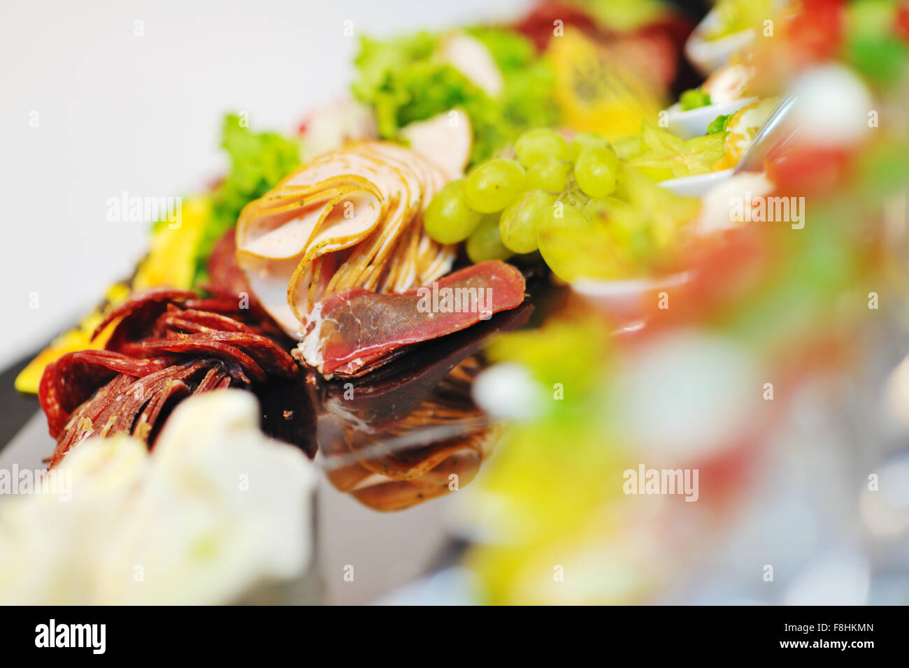 buffed food closeup of fruits, vegetables, meat and fish arranged on ...