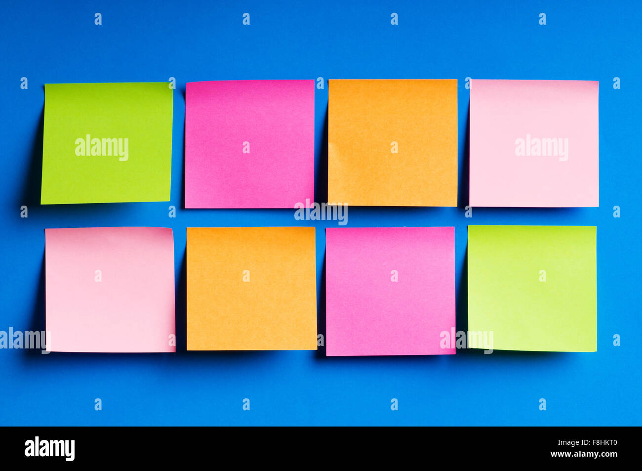 Reminder notes on the bright colorful paper Stock Photo - Alamy